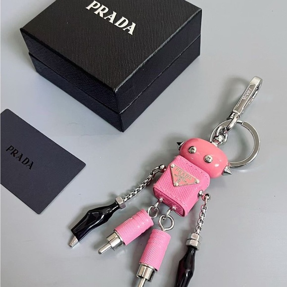 💎Prada | Accessories | Prada Pink And Black Robot Key Holder | Poshmark